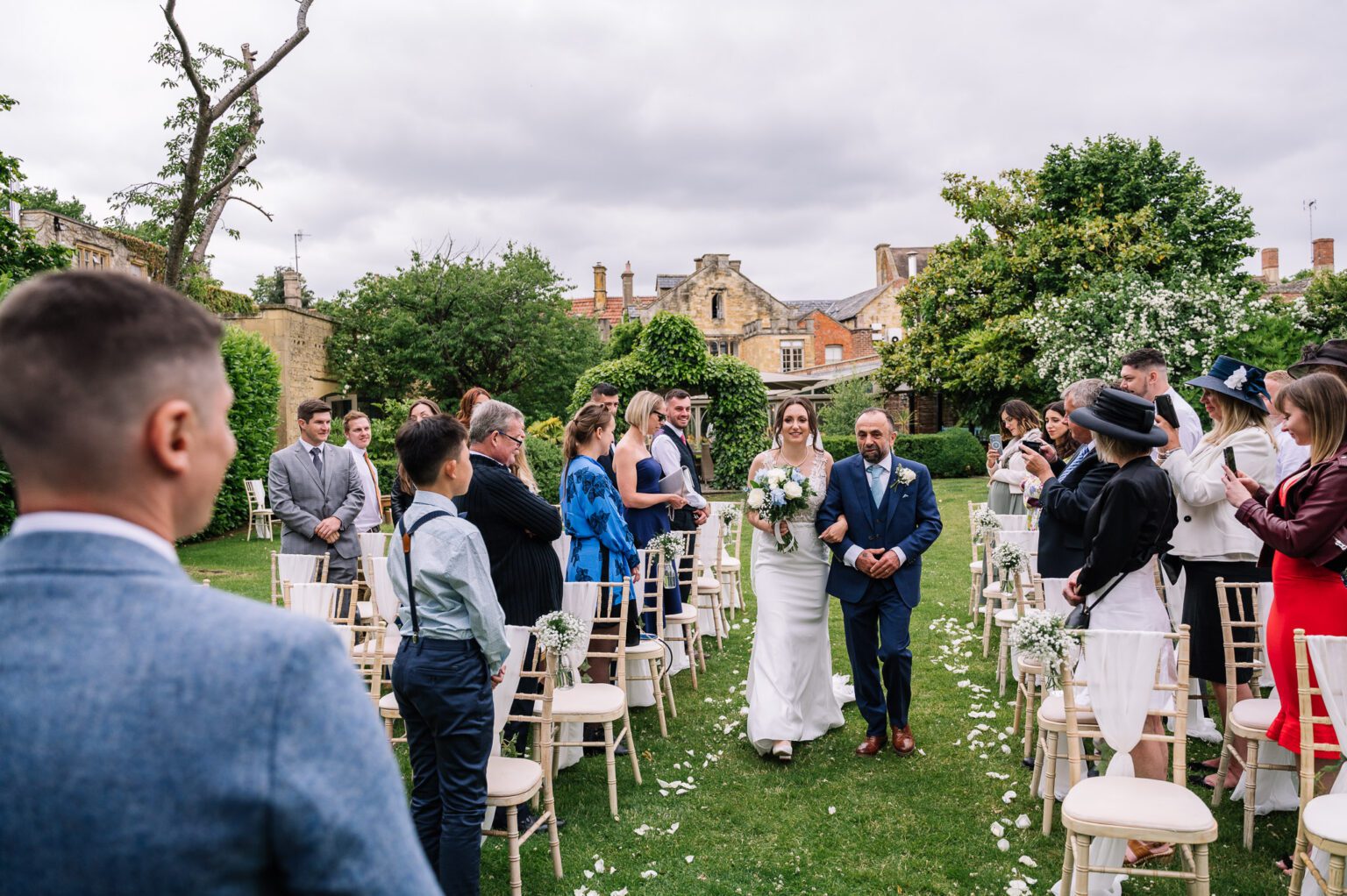 Manor house hotel wedding with outdoor ceremony